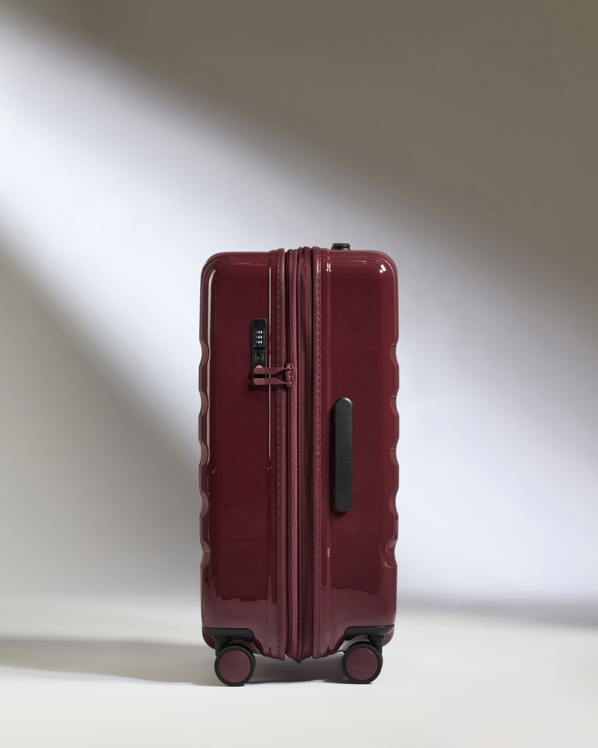 Medium Suitcase in Red Gloss - Icon Stripe | Lightweight & Hard Shell ...